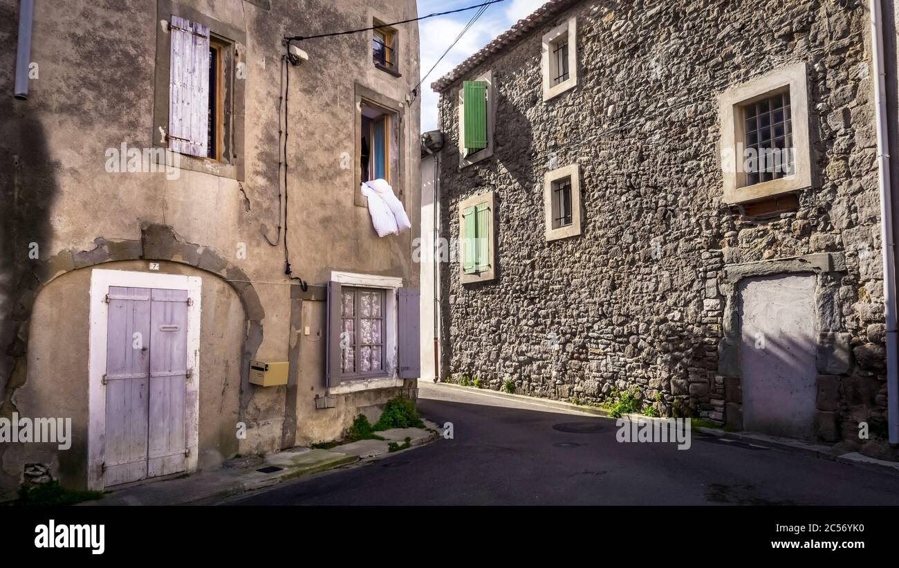 Village alley in Azille in winter Stock Photo - Alamy