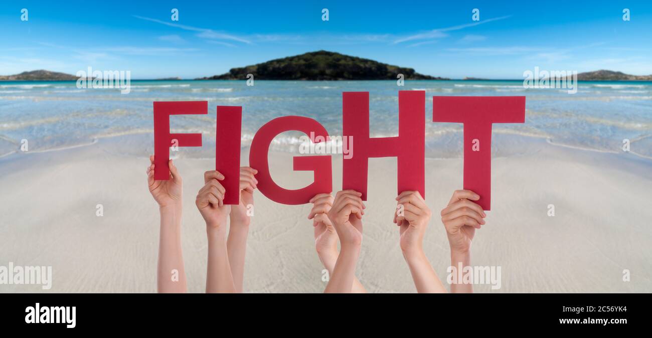 People Hands Holding Word Fight, Ocean Background Stock Photo - Alamy