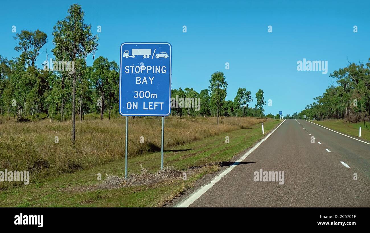 Stopping bay sign with truck and car icons on Australian bush highway ...