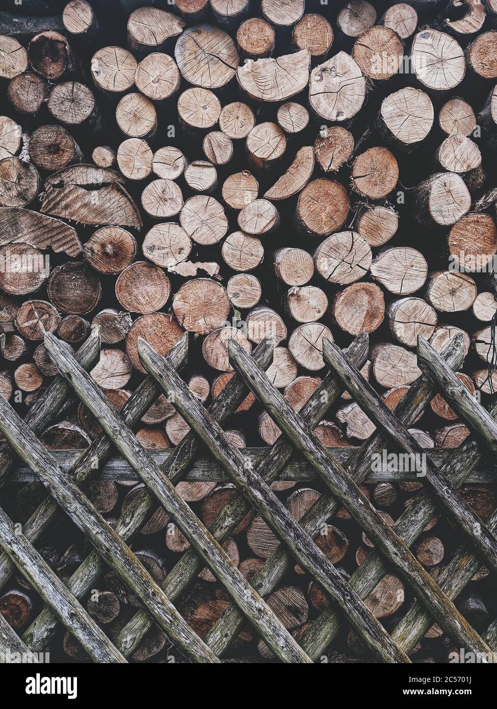 Pile of wood in front of a hunter's fence Stock Photo - Alamy