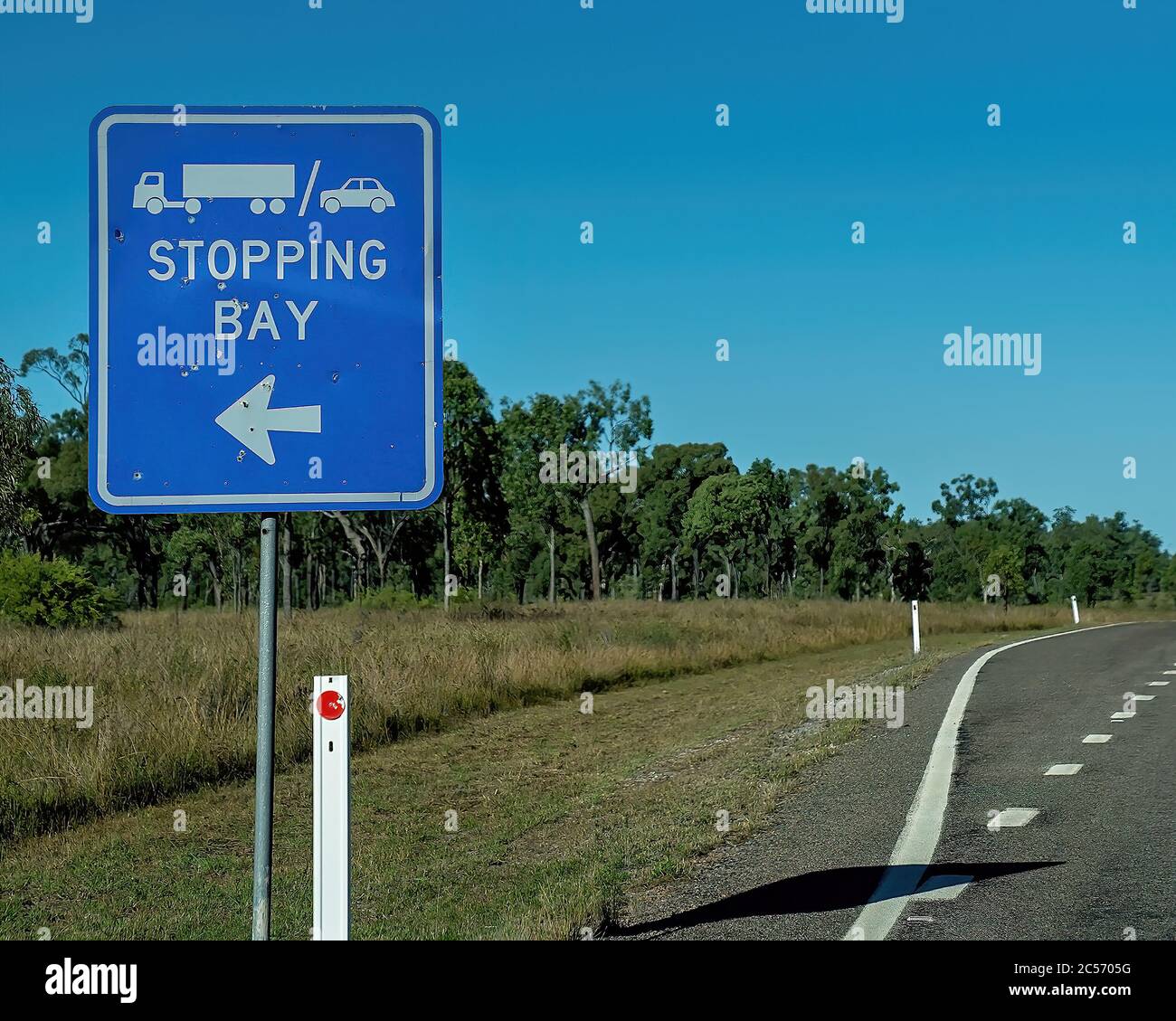 Stopping bay sign with truck and car icons on Australian bush highway ...