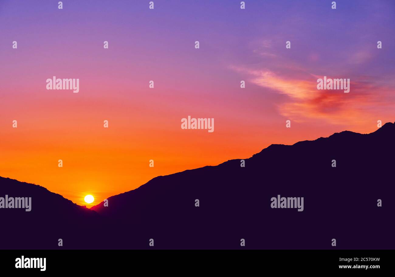 Rising sun over the crests of the mountains; sunny background Stock ...