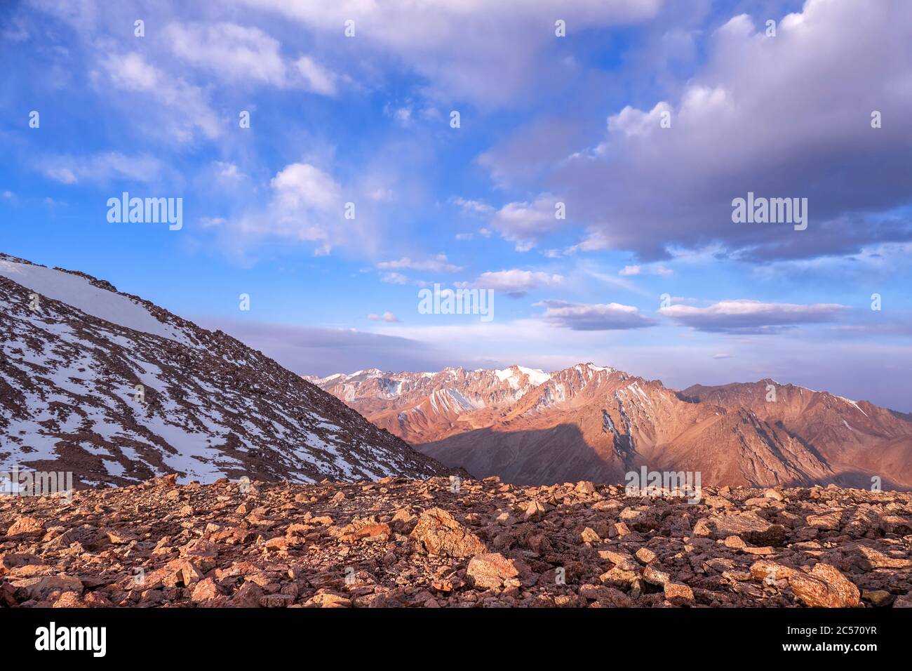 Mountain peaks at sunrise; melting glaciers in a Global Warming ...