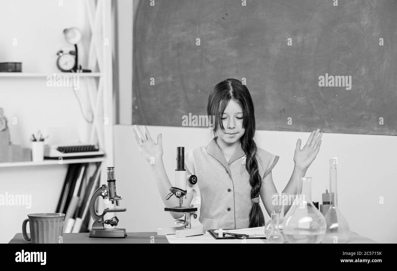 Small girl with microscope. Girl biology class testing tubes. Science ...