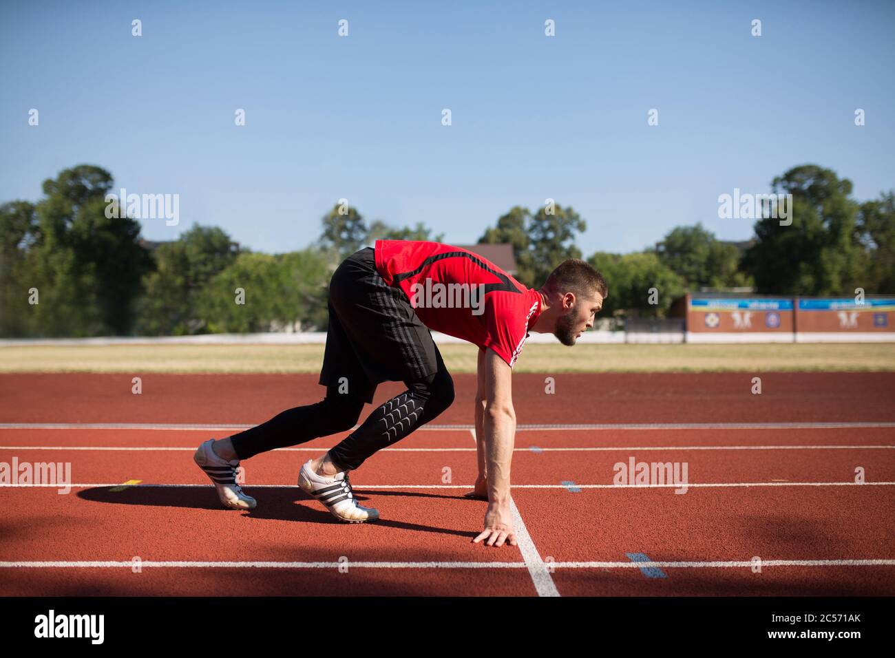 Man in starting position hi-res stock photography and images - Alamy