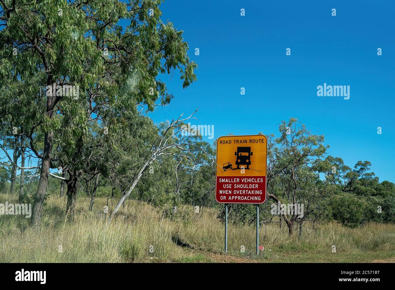 Road train route sign advising smaller vehicles to use the road should ...