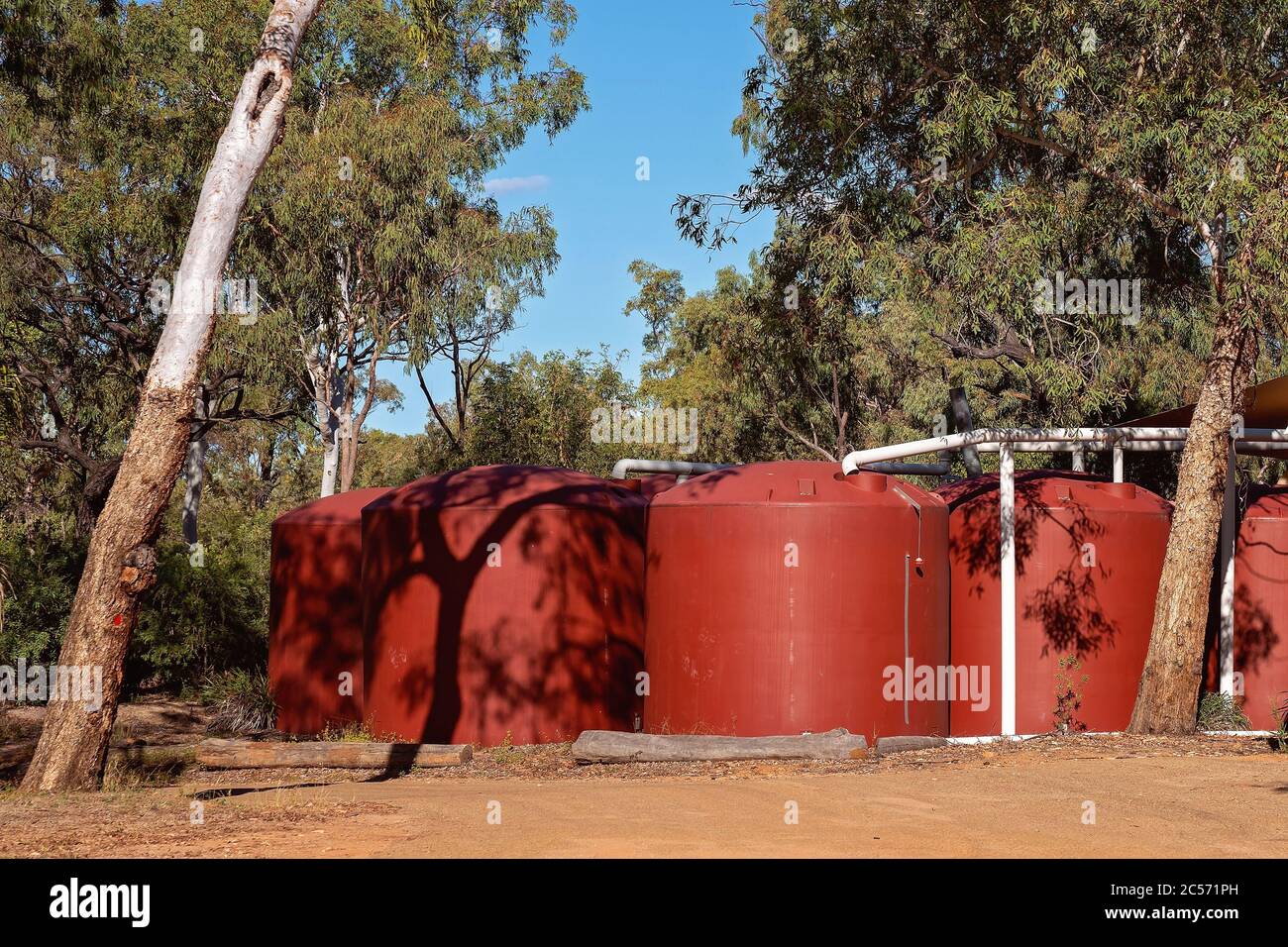 Large water tanks at an Australian outback tourist resort in a volcanic ...