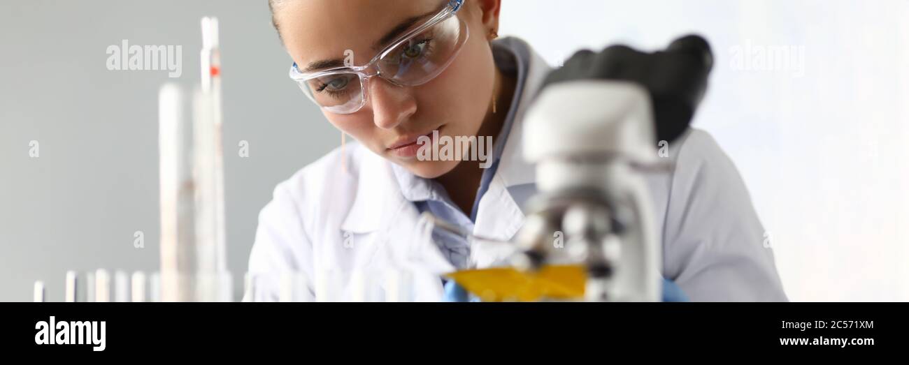 Researcher working in lab Stock Photo - Alamy