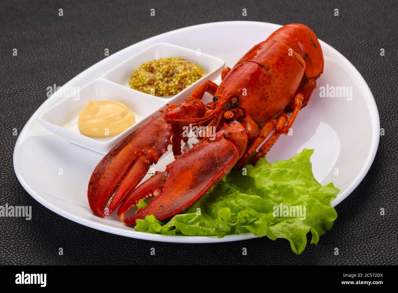 Luxury Lobster with sauces - ready for eat Stock Photo - Alamy