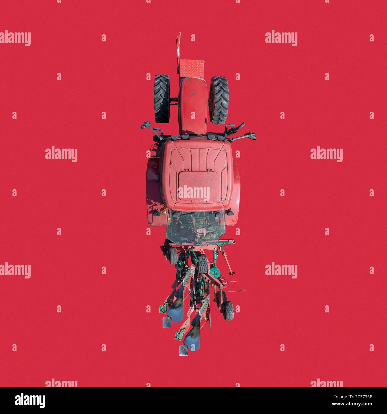 View from above tractor on red background Stock Photo - Alamy