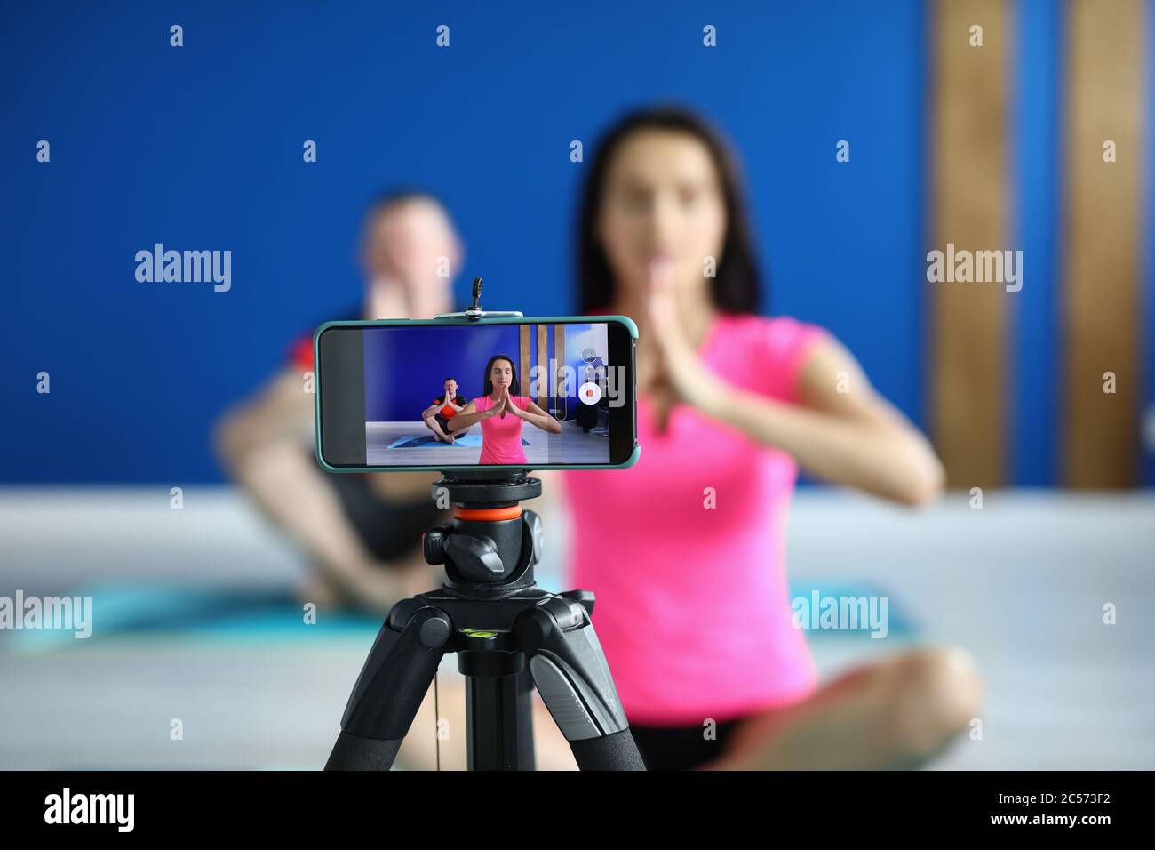 Smartphone standing on tripod Stock Photo - Alamy