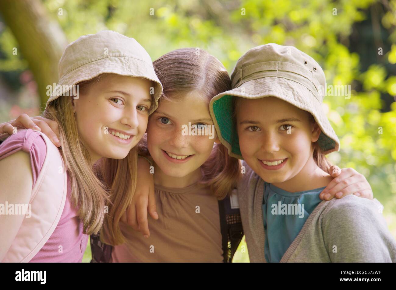 Happy schoolgirl smiling posing hi-res stock photography and images - Alamy