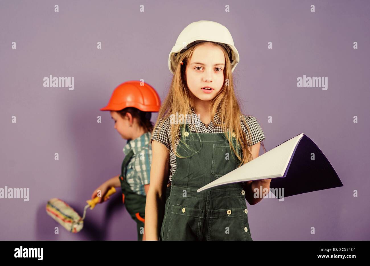 Kids girls planning renovation. Repaint walls. Move in new apartment ...