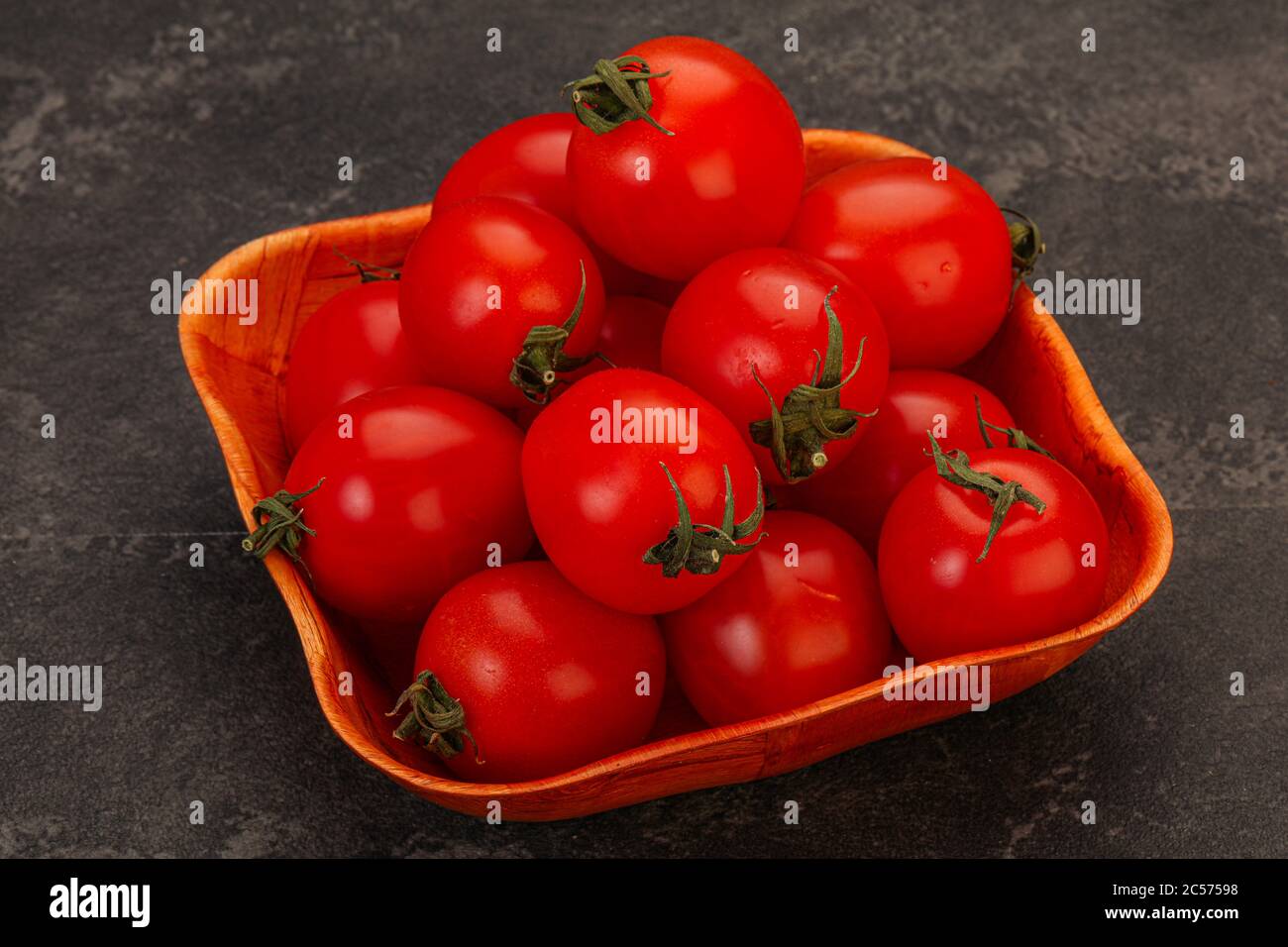 Ripe juicy red cherry tomato in the bowl Stock Photo - Alamy