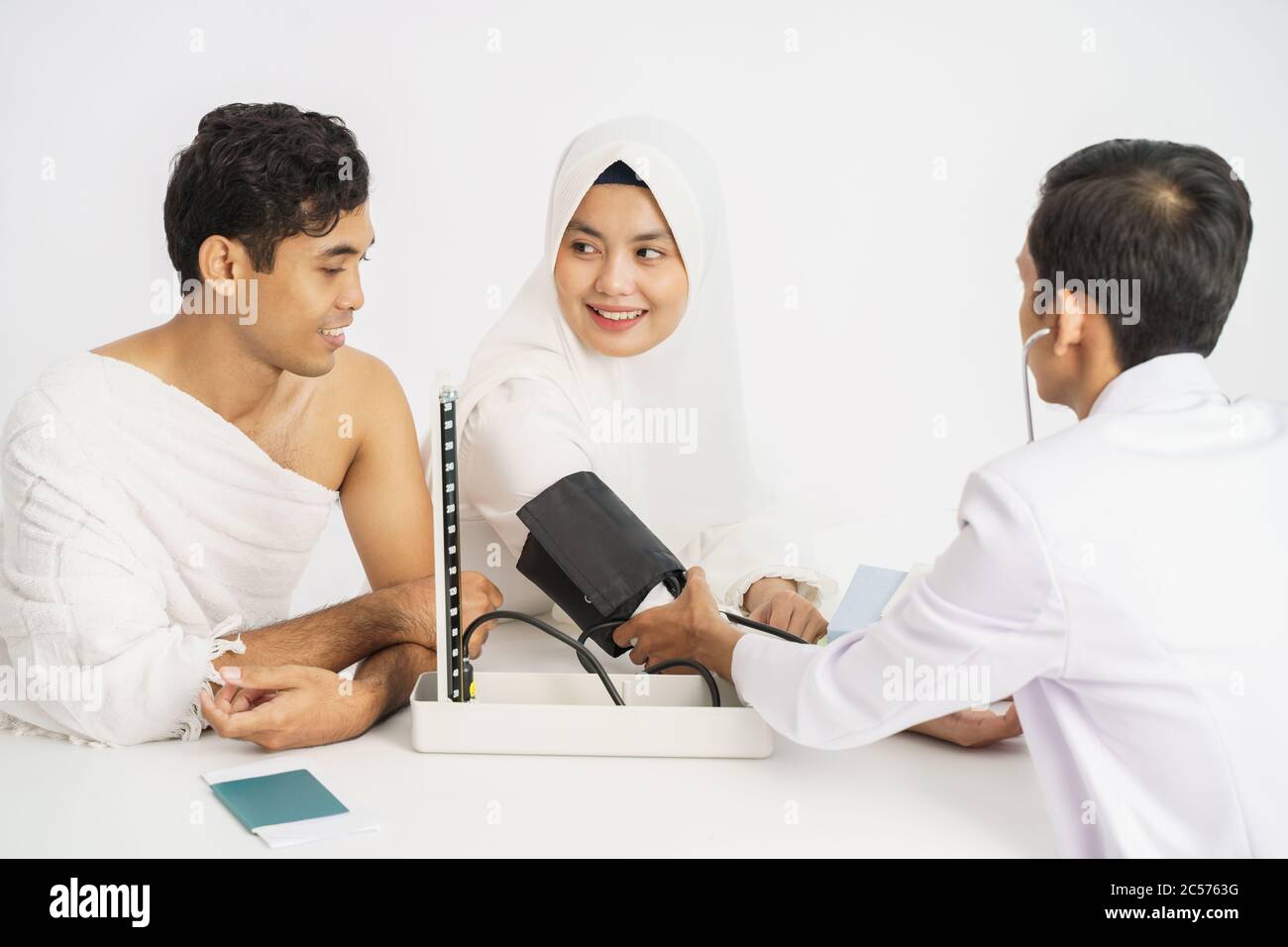 muslim medical checkup before hajj or umrah with doctor Stock Photo - Alamy