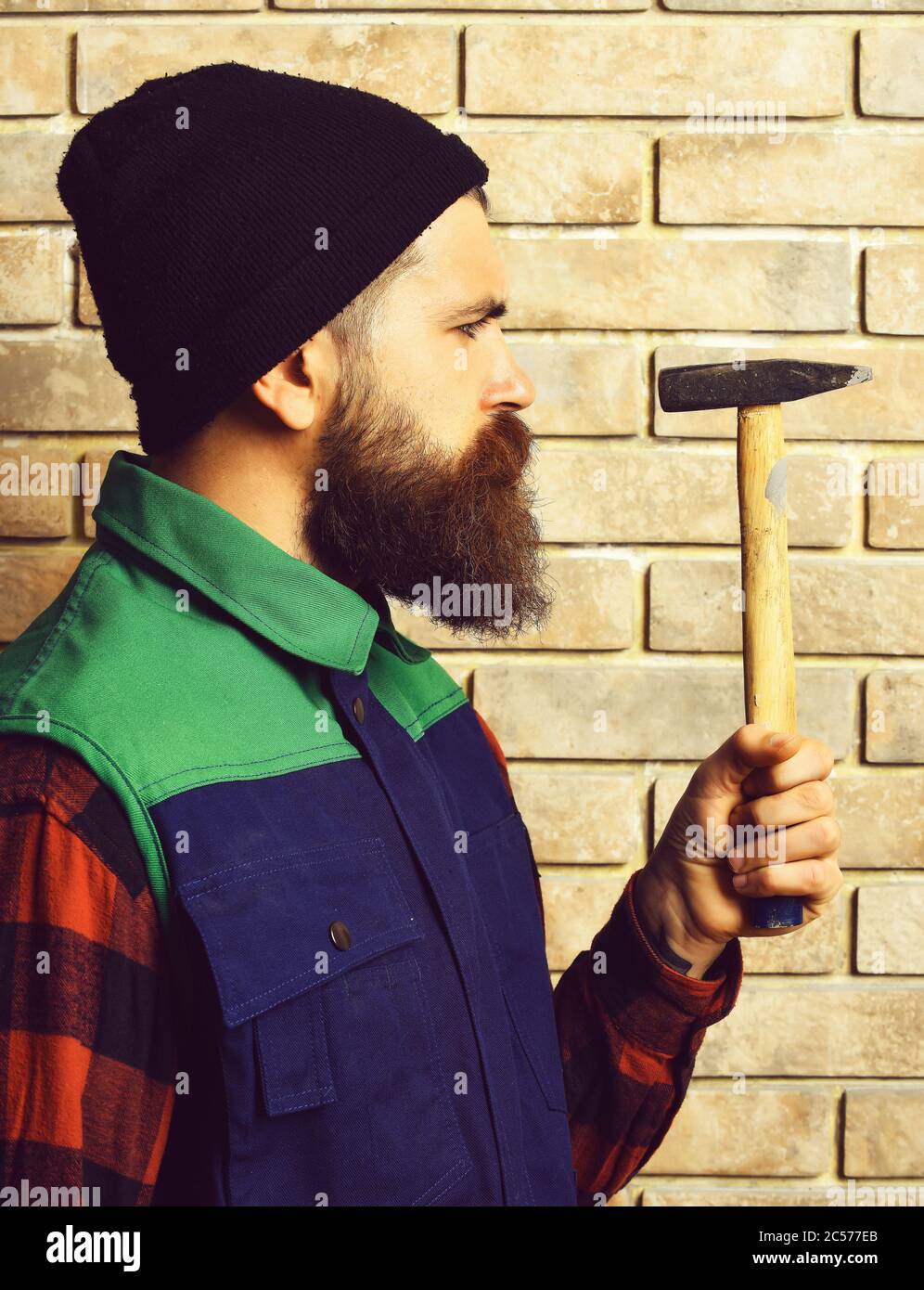 bearded builder man, long beard, brutal caucasian hipster with ...