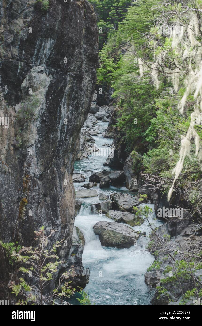 Vertical shot of a river in a mountain at Patagonia, Argentina Stock ...