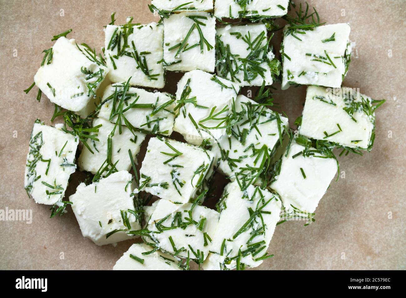 Feta cheese filling with fennel on beige background Stock Photo - Alamy
