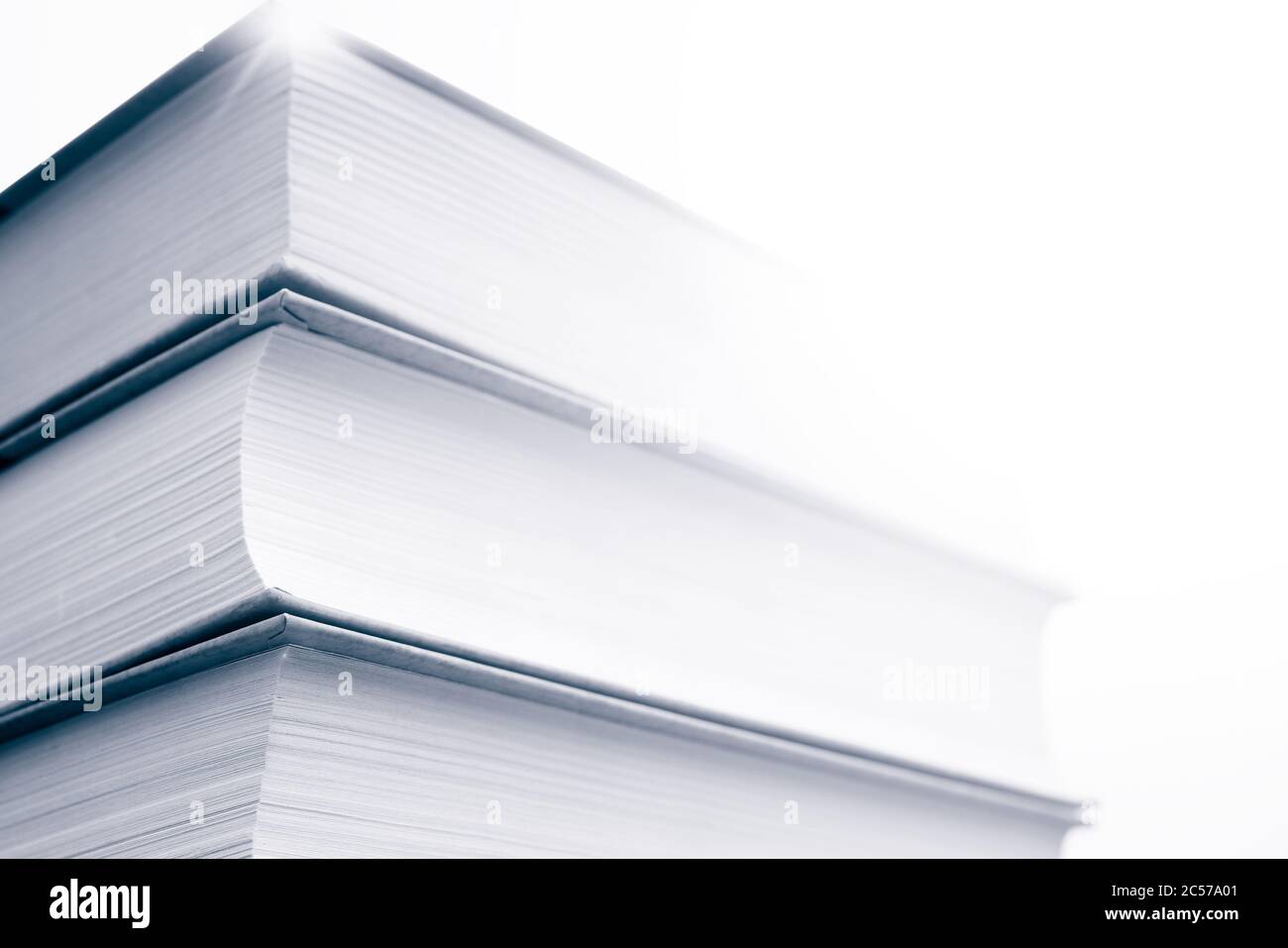 Thick paper books are a symbol of education and wisdom. A stack of ...