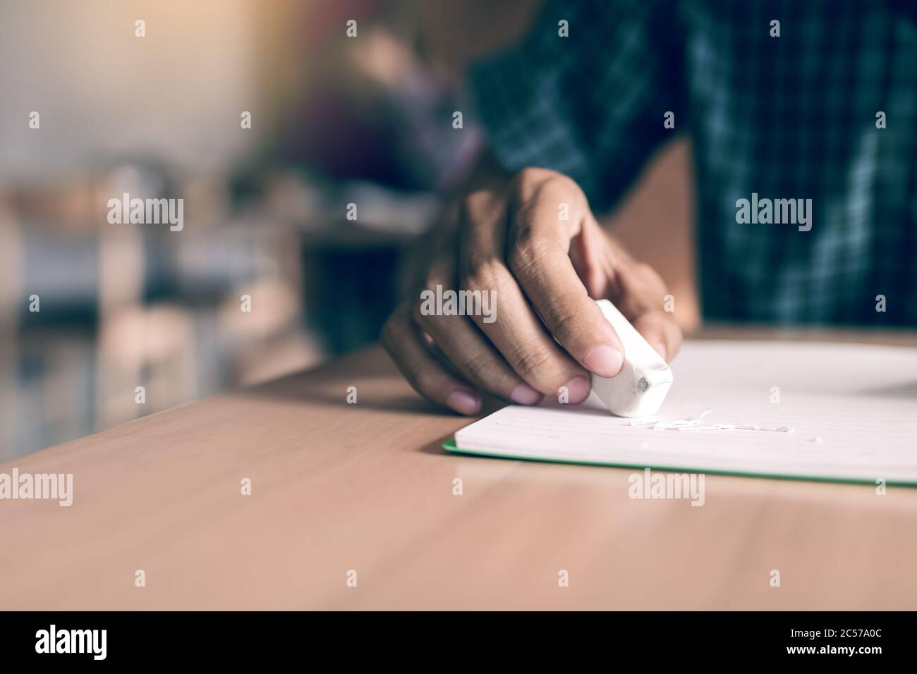 Using an eraser hi-res stock photography and images - Alamy