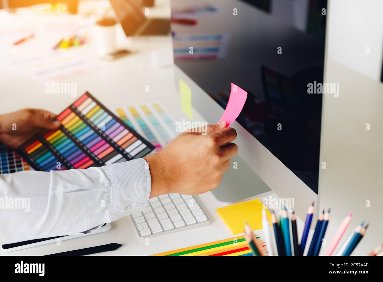 Hand is sticking sticker hi-res stock photography and images - Alamy