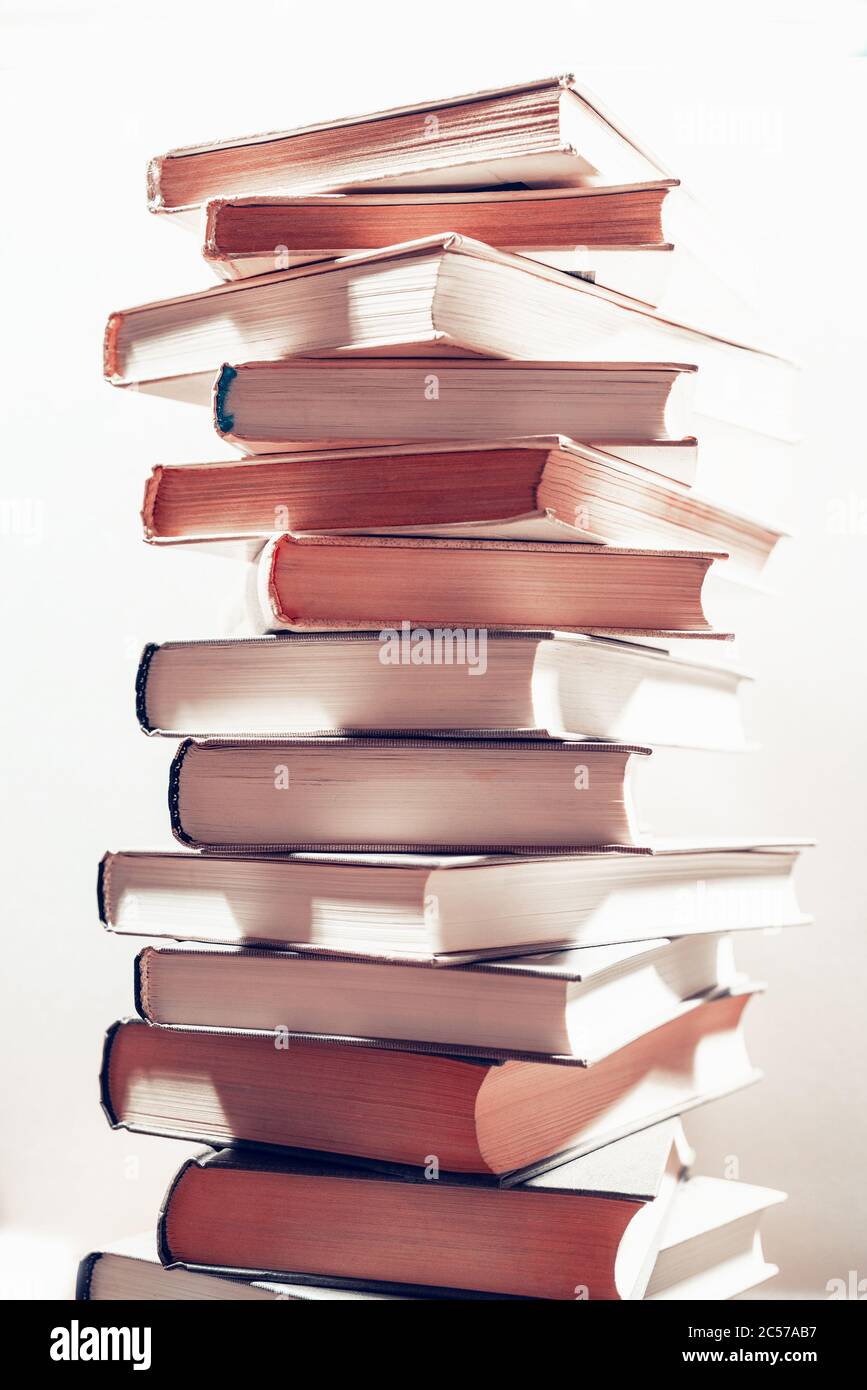 Stack of books in library. Scientific, educational, and fiction paper ...