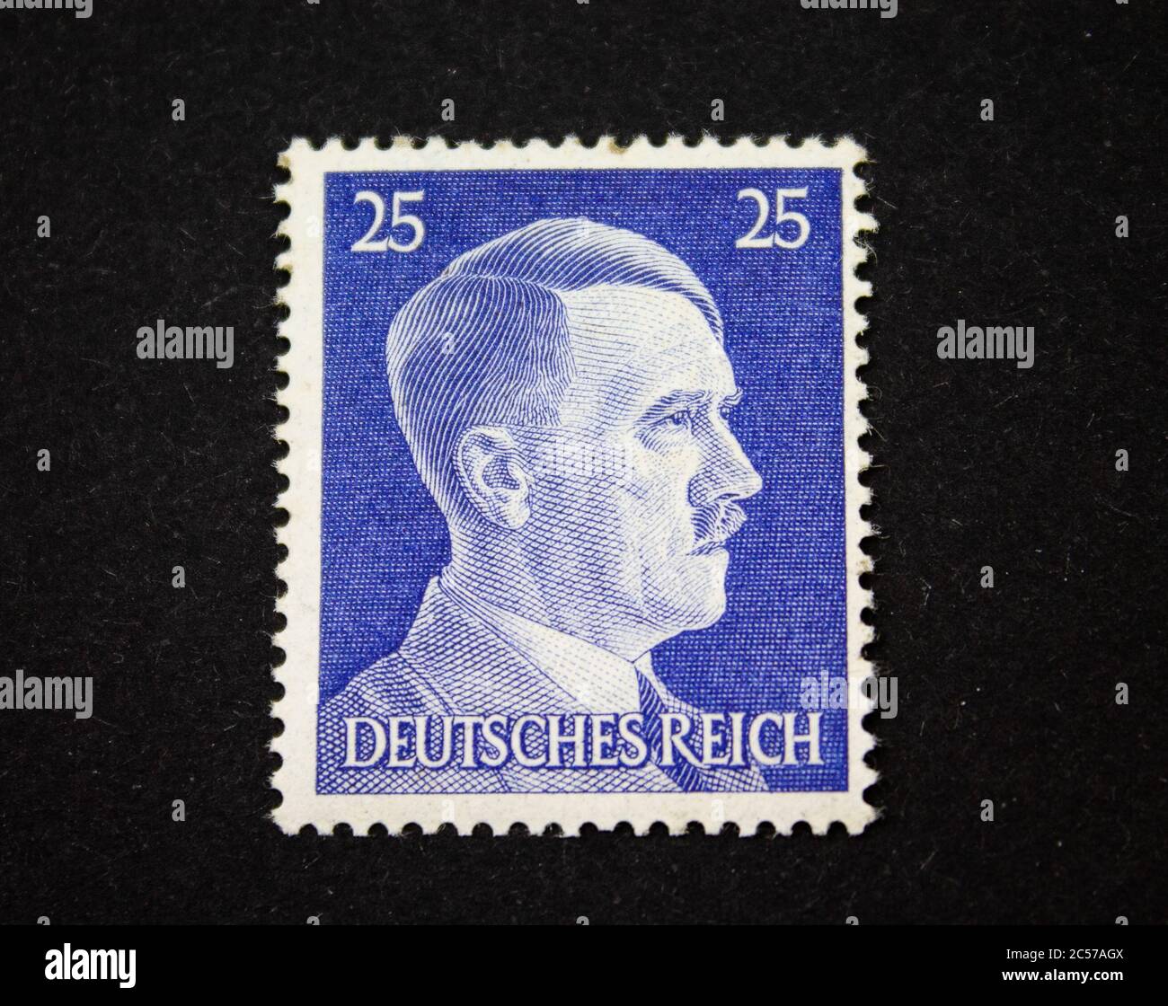 Blue postage stamp German Reich 25 Pfennig with a black beackround ...