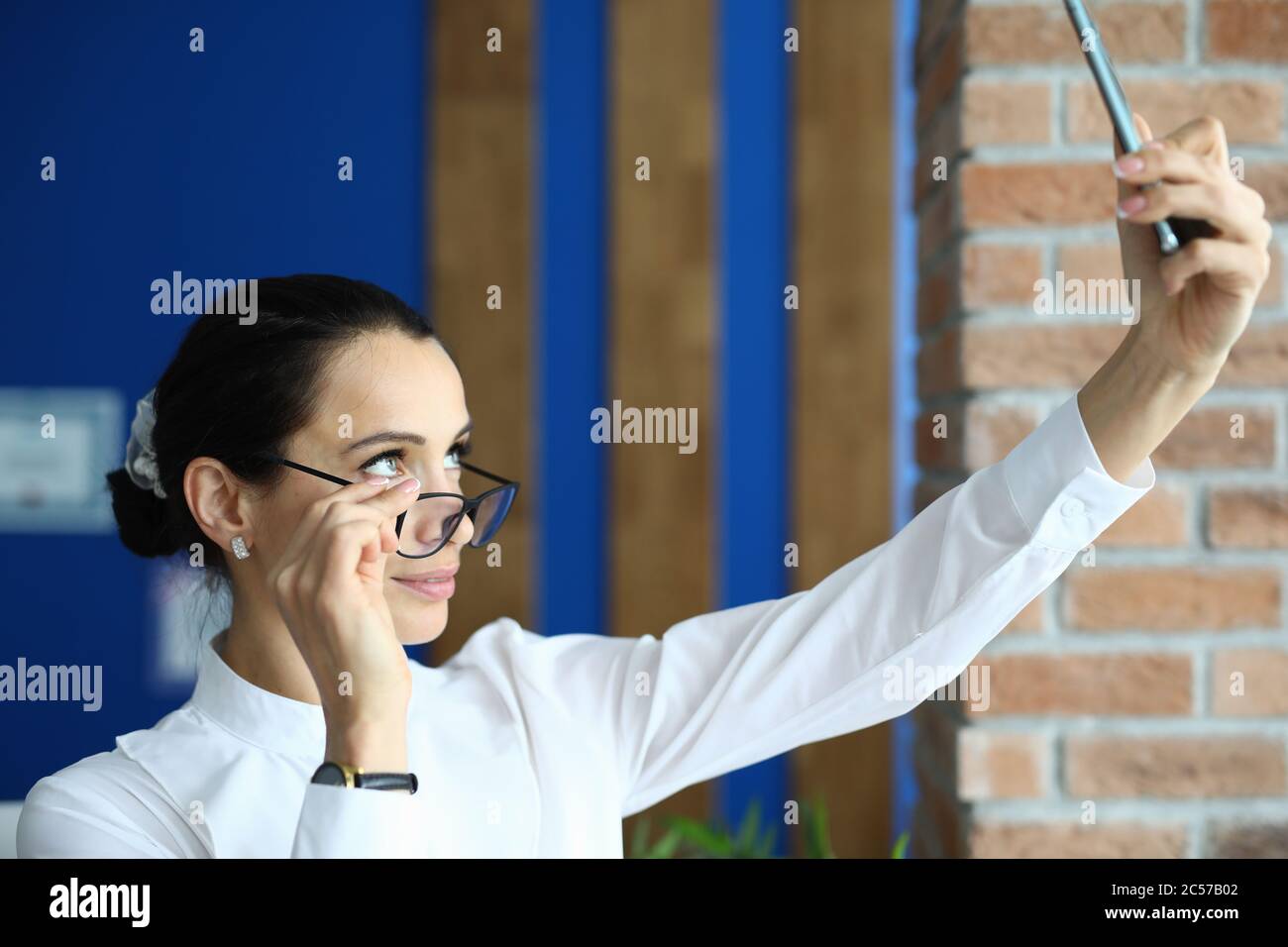 Cute professional manager indoors Stock Photo - Alamy