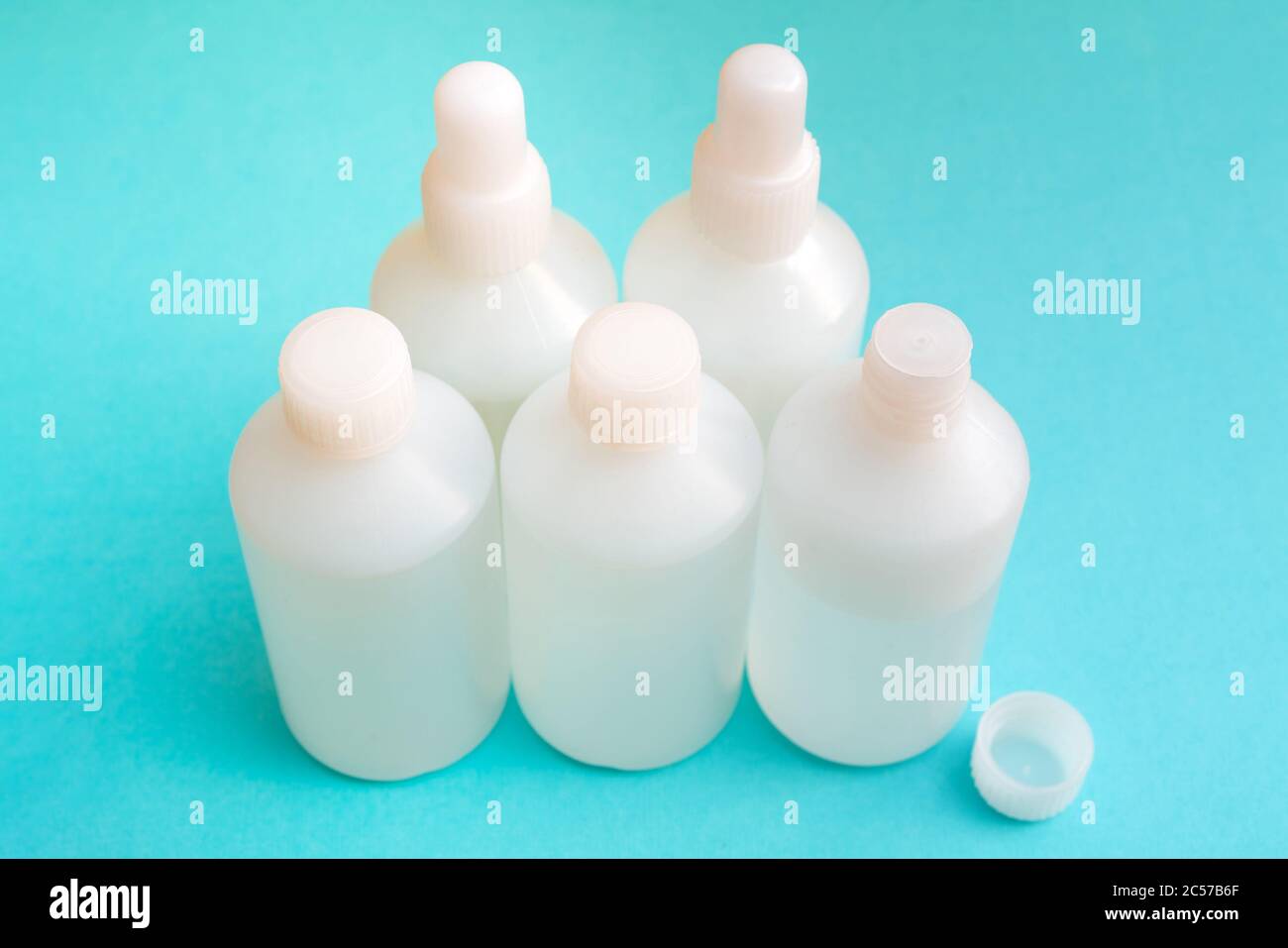 Disinfectant liquid in a white bottle. Therapeutic drug. Disinfection ...