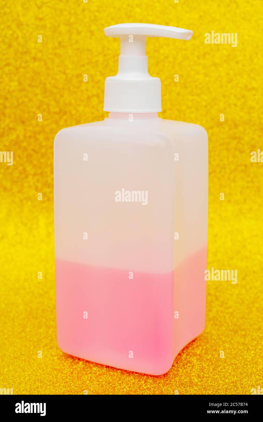 Antibacterial disinfectant soap. Liquid pink soap in white bottle Stock ...