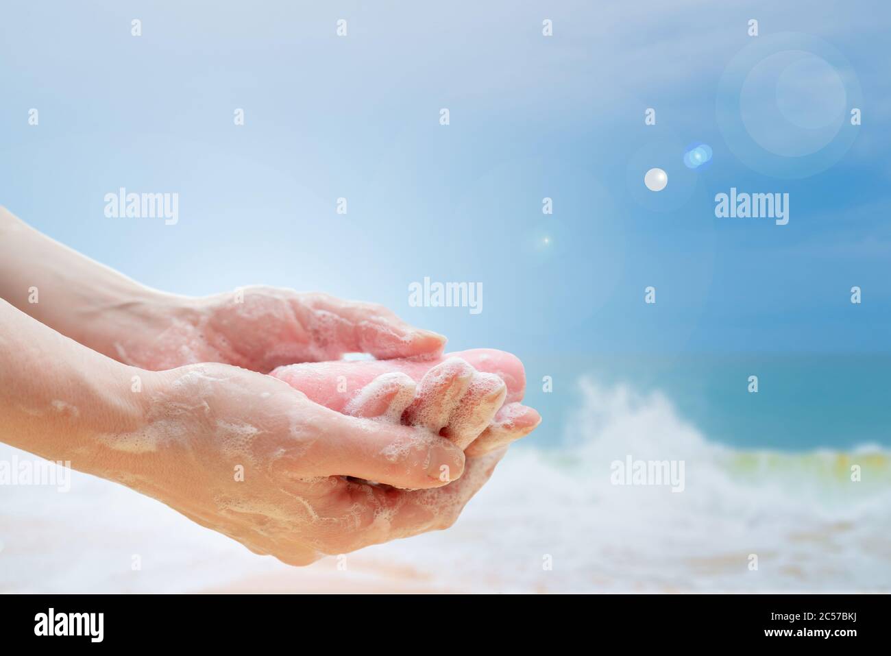 Antibacterial soap in the hands. Hand disinfection with soap ...