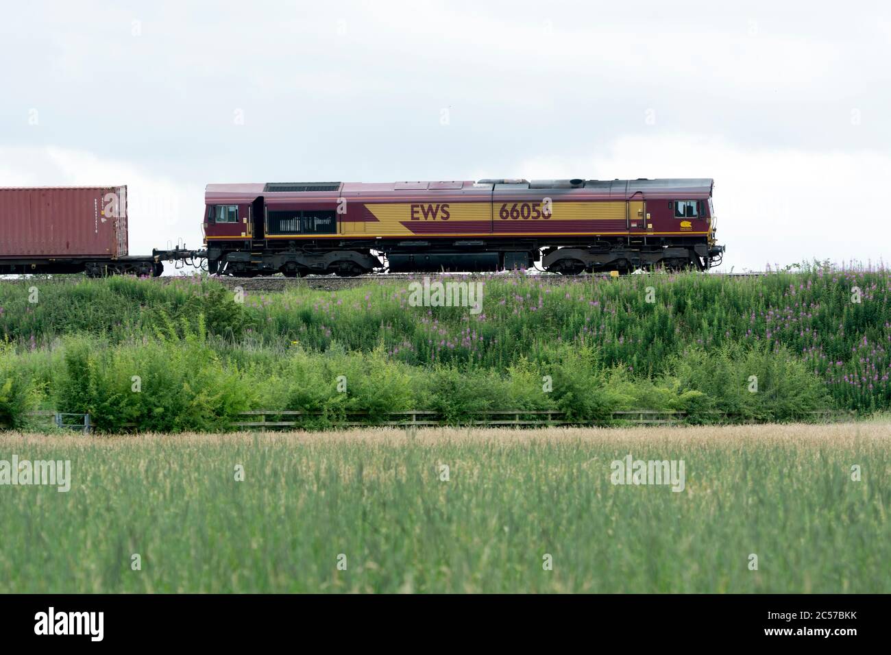 EWS Class 66 diesel locomotive No. 66056 pulling a freightliner train ...