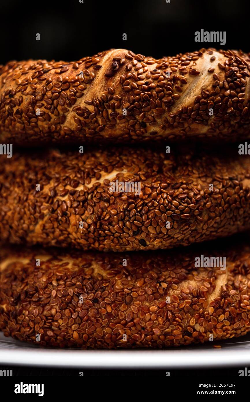 A stack of turkish simit with sesame seeds, macro Stock Photo - Alamy