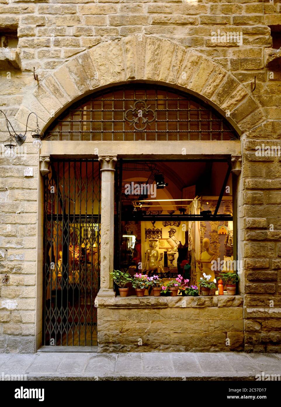 Medieval city detail, a window showcase of a little store framed by an ...