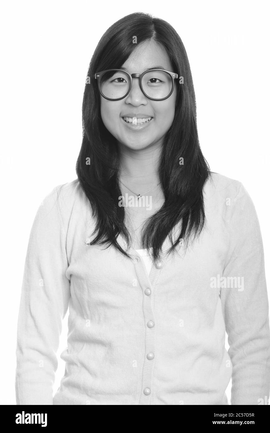 Happy young beautiful Asian nerd woman smiling Stock Photo - Alamy