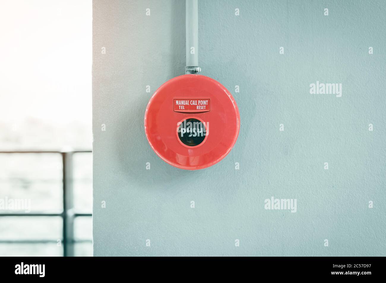 Red fire alarm button on wall Stock Photo - Alamy