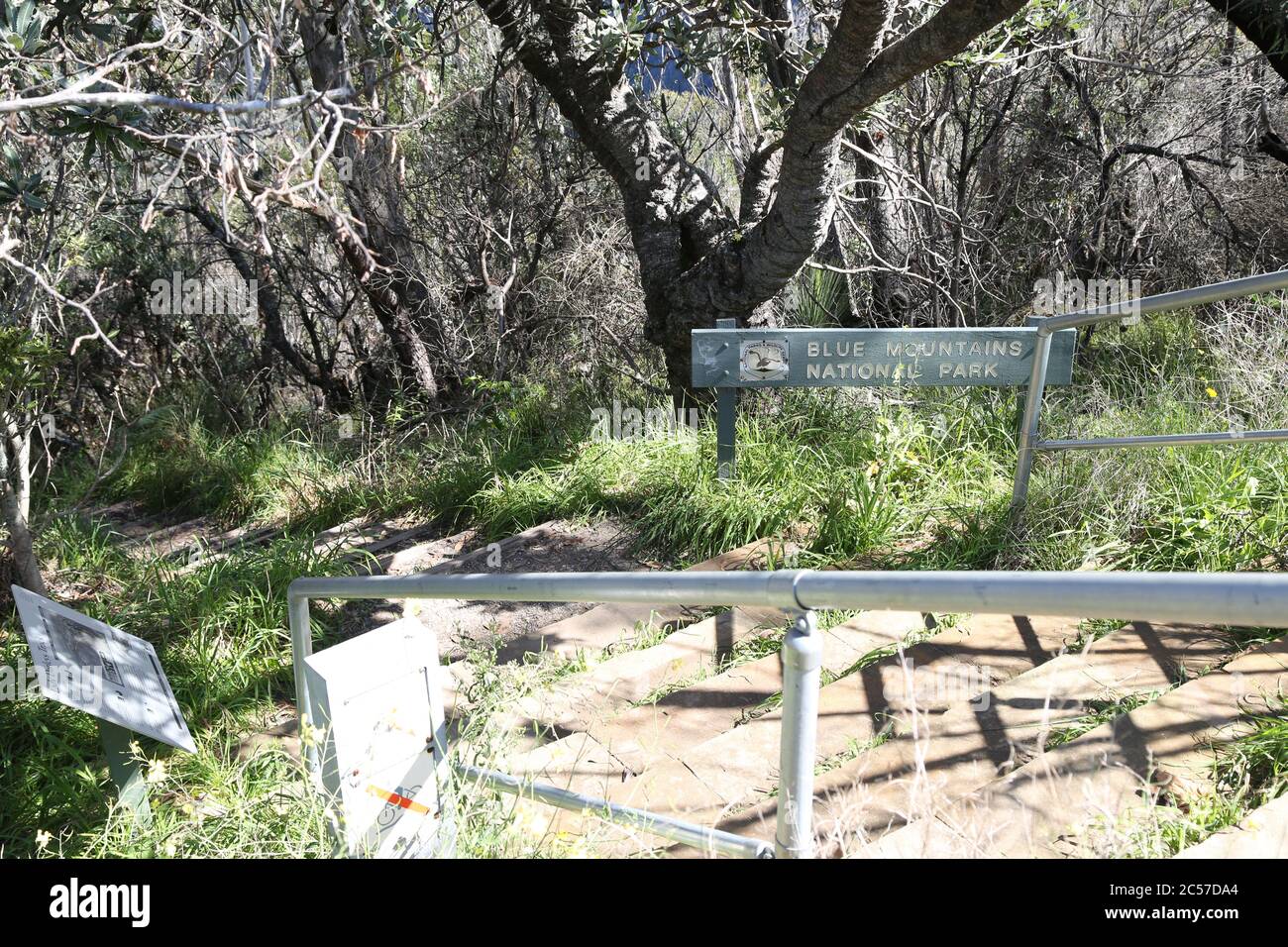 A sign indicates the entrance to the Blue Mountains National Park ...