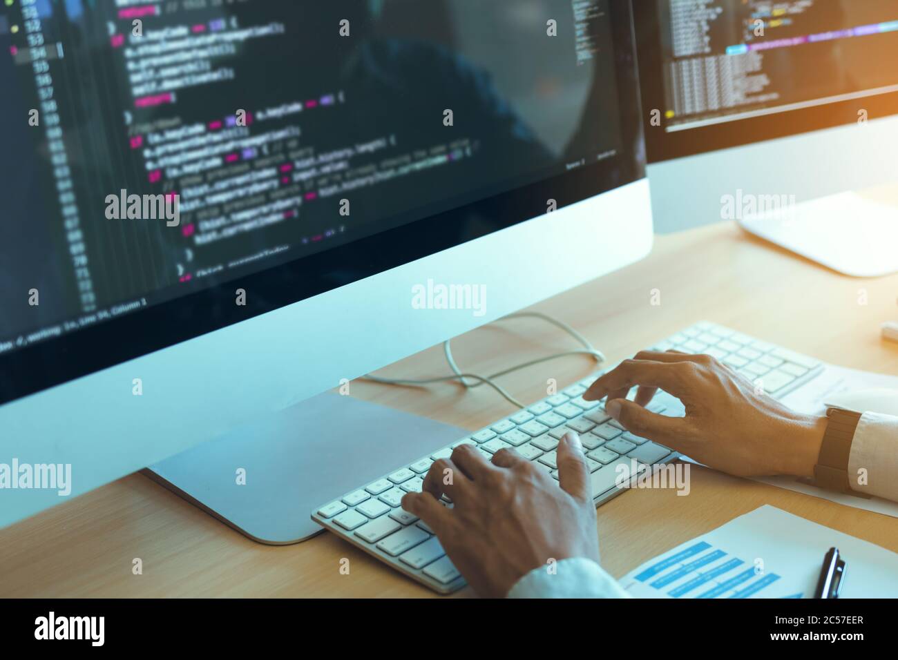 Asian man working code program developer computer web development working design software on ...