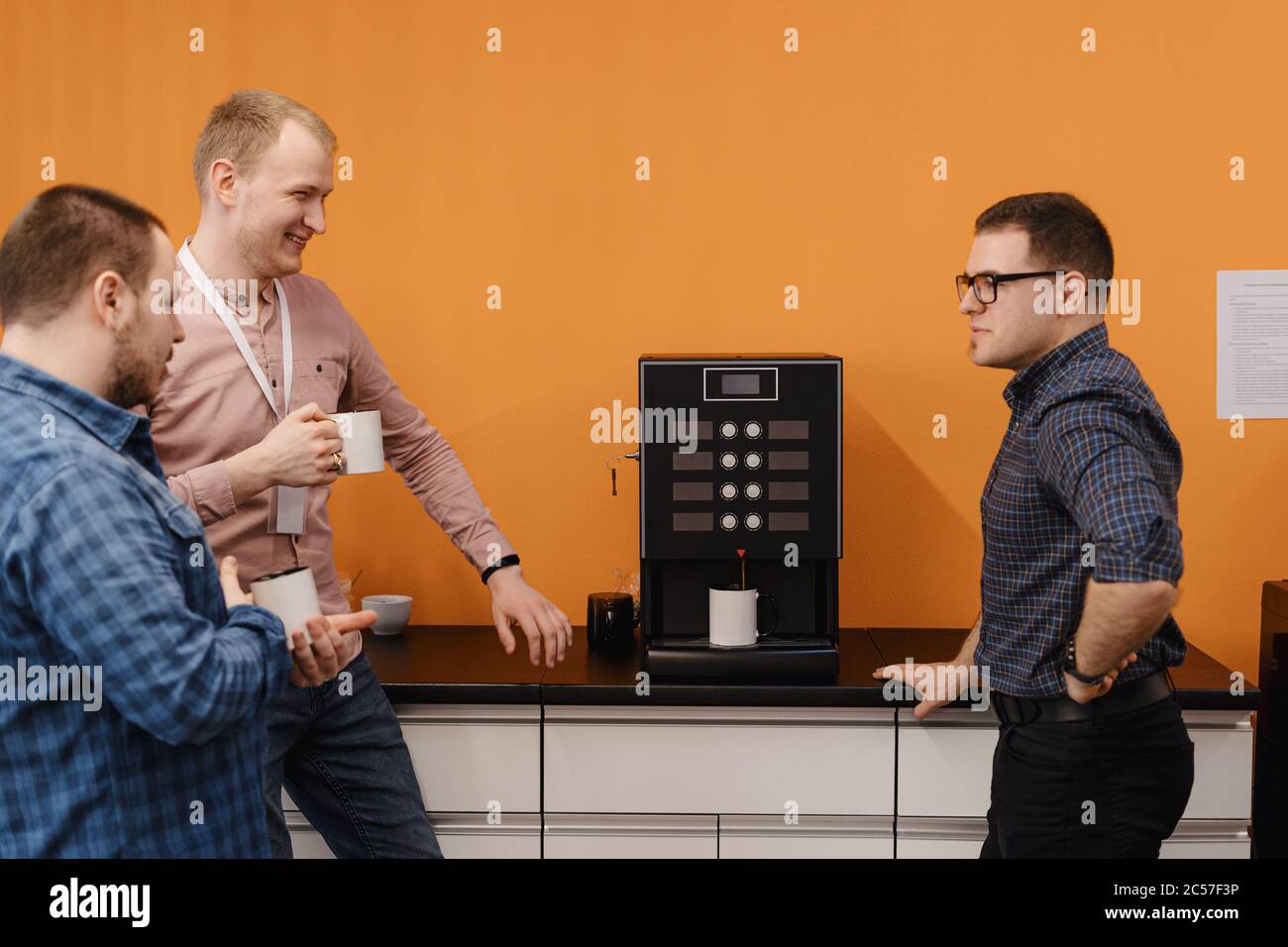 Happy diverse colleagues have fun at lunch break in office, smiling ...