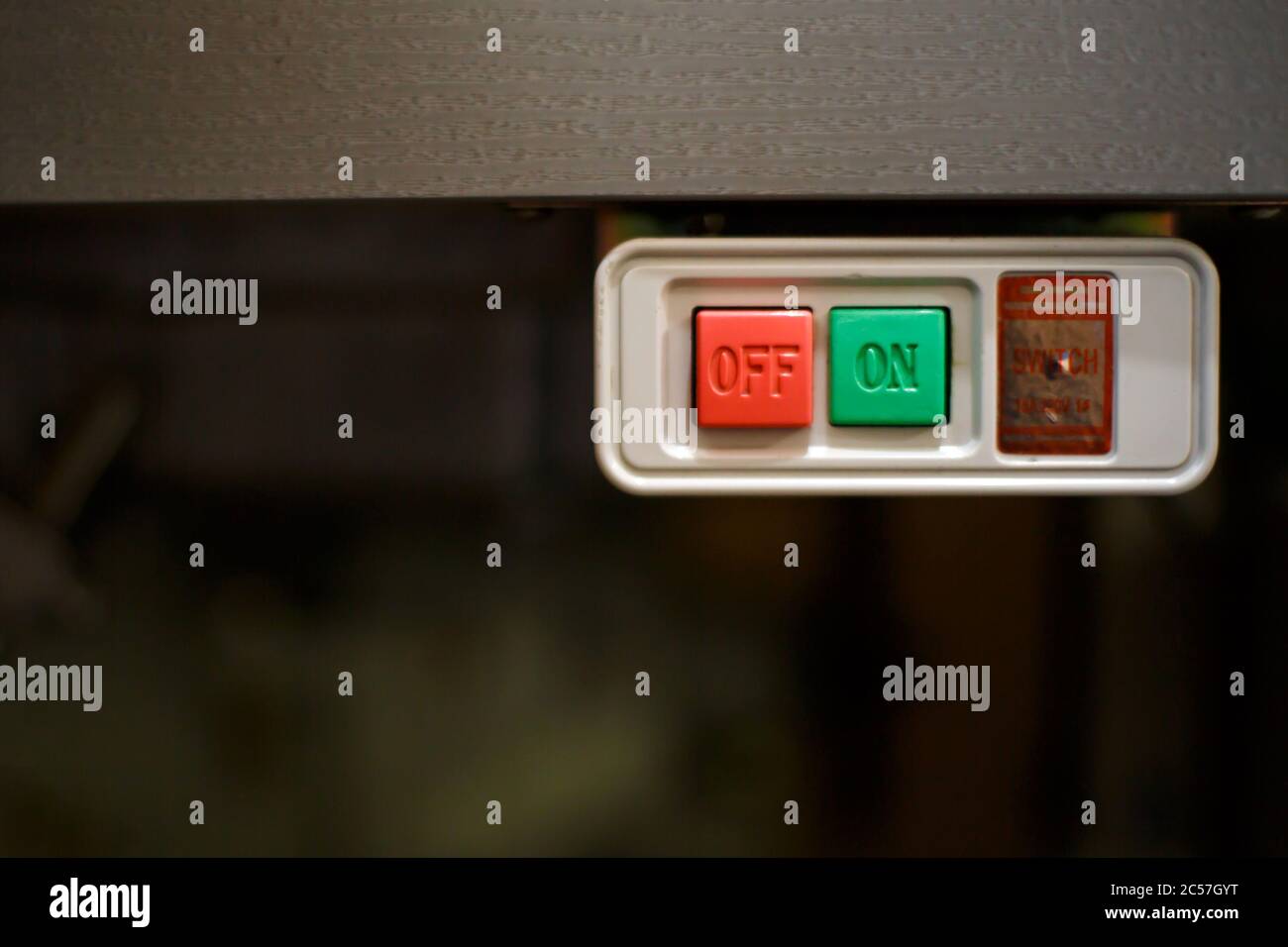 Close-up of a sewing machine button. workplace tailor. sewing industry ...