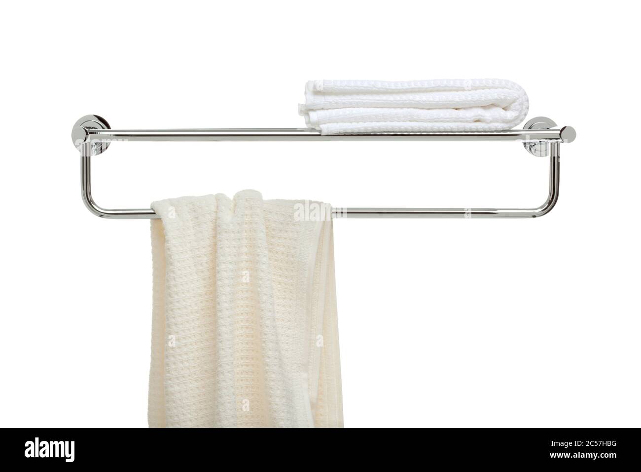 three terry cloth towels hanging and lying on a chrome plated towel ...
