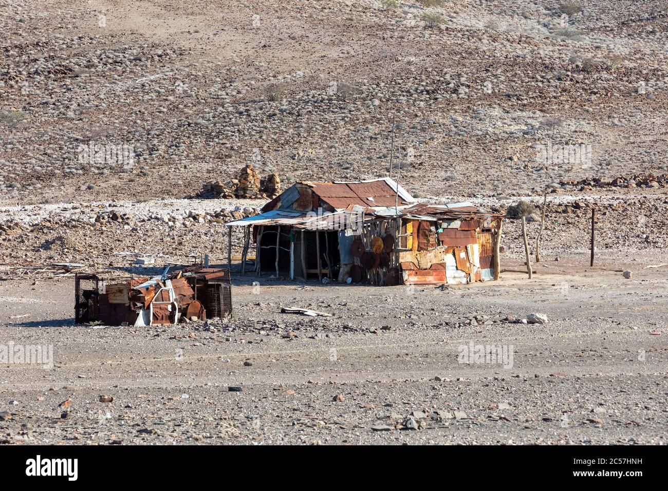 Traditional african hut from rusty sheet of tin in desert of Erongo ...