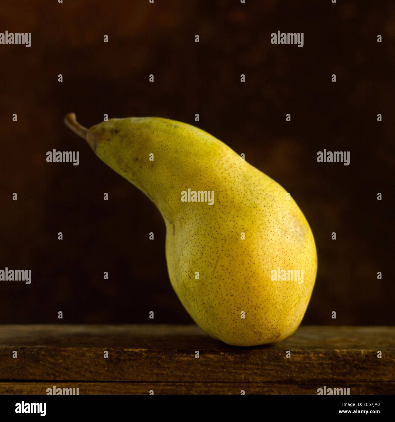 Pears on black background Stock Photo - Alamy
