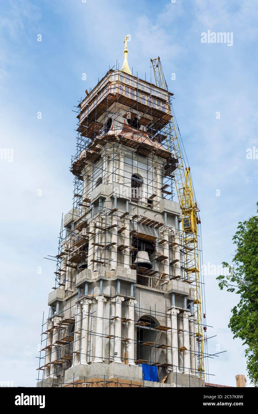 Scaffolding installed at old church building high level. The concept of ...