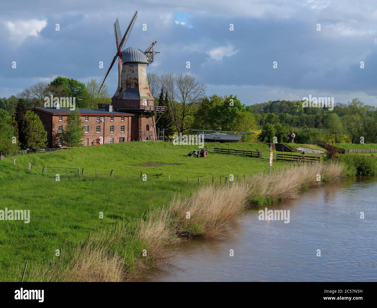 three-storey Dutch gallery windmill Caroline. river meadow of river ...