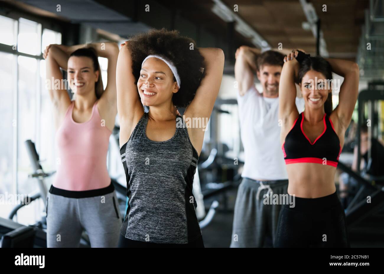 Team workout in gym to reach goals Stock Photo - Alamy
