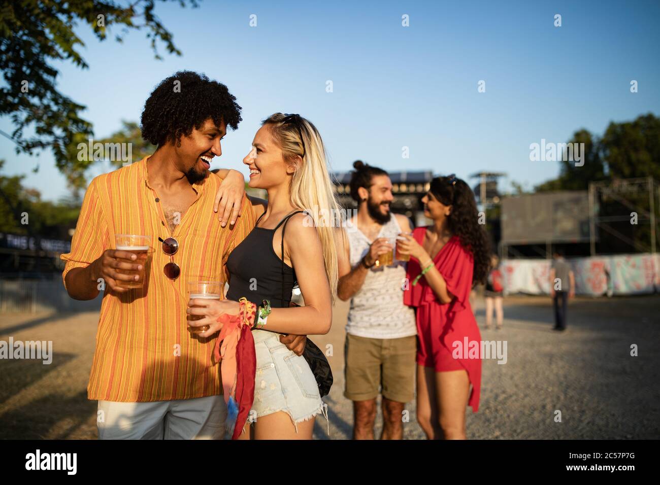 Group of happy friends people having fun together outdoors Stock Photo ...