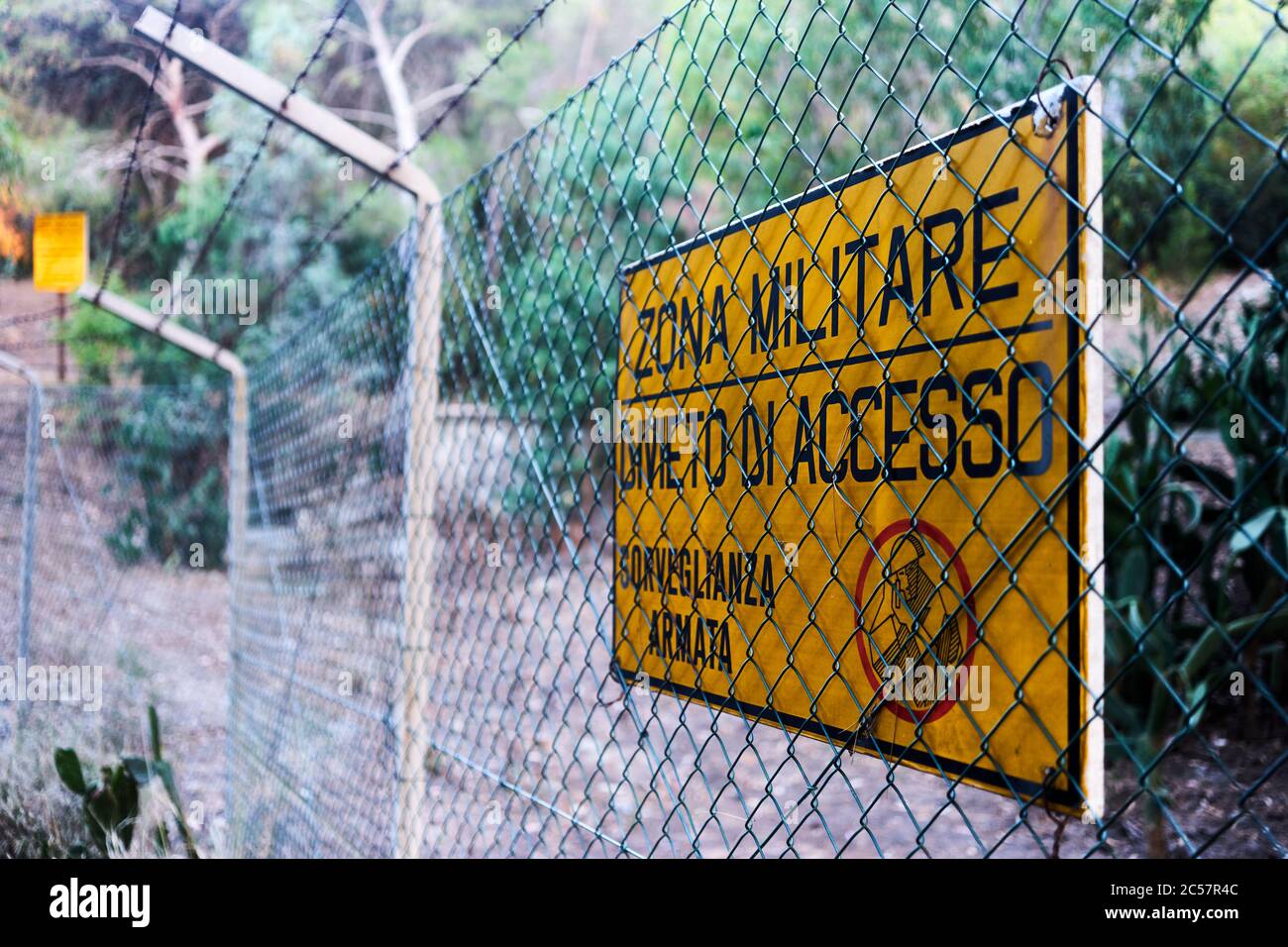 sign prohibiting access to the military zone Stock Photo - Alamy