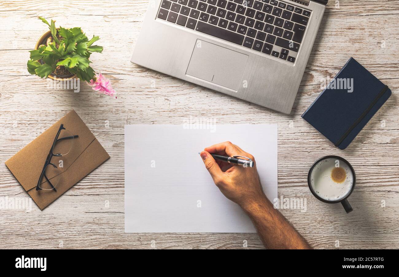 Student writing paper desk hi-res stock photography and images - Alamy