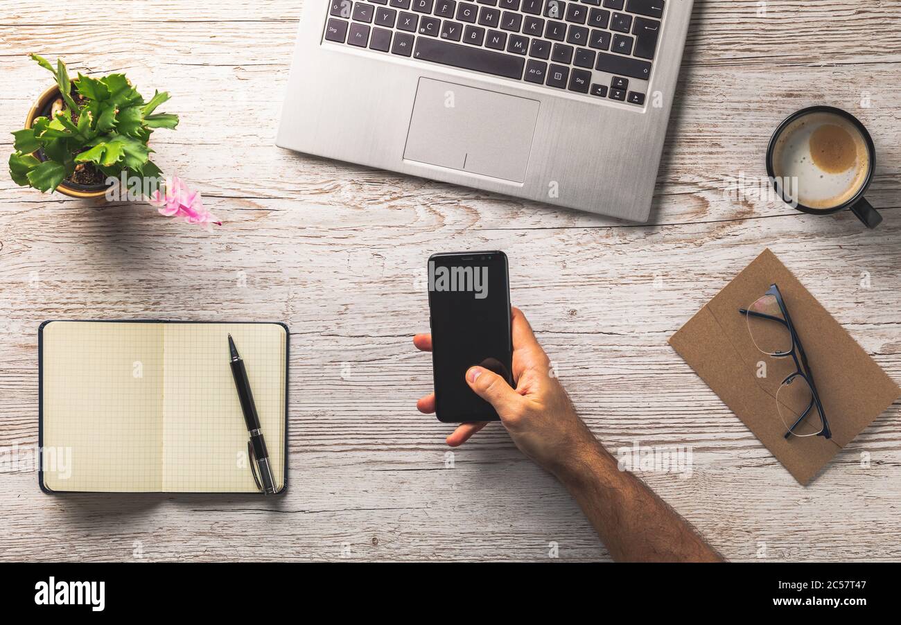 Kitchen table with blank screen smartphone hi-res stock photography and ...